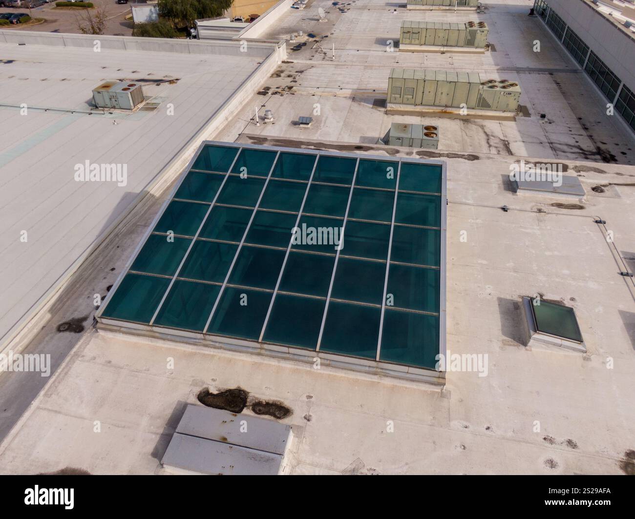 Day Time Drone Images of Large Commercial Building With a TPO Roof and ...