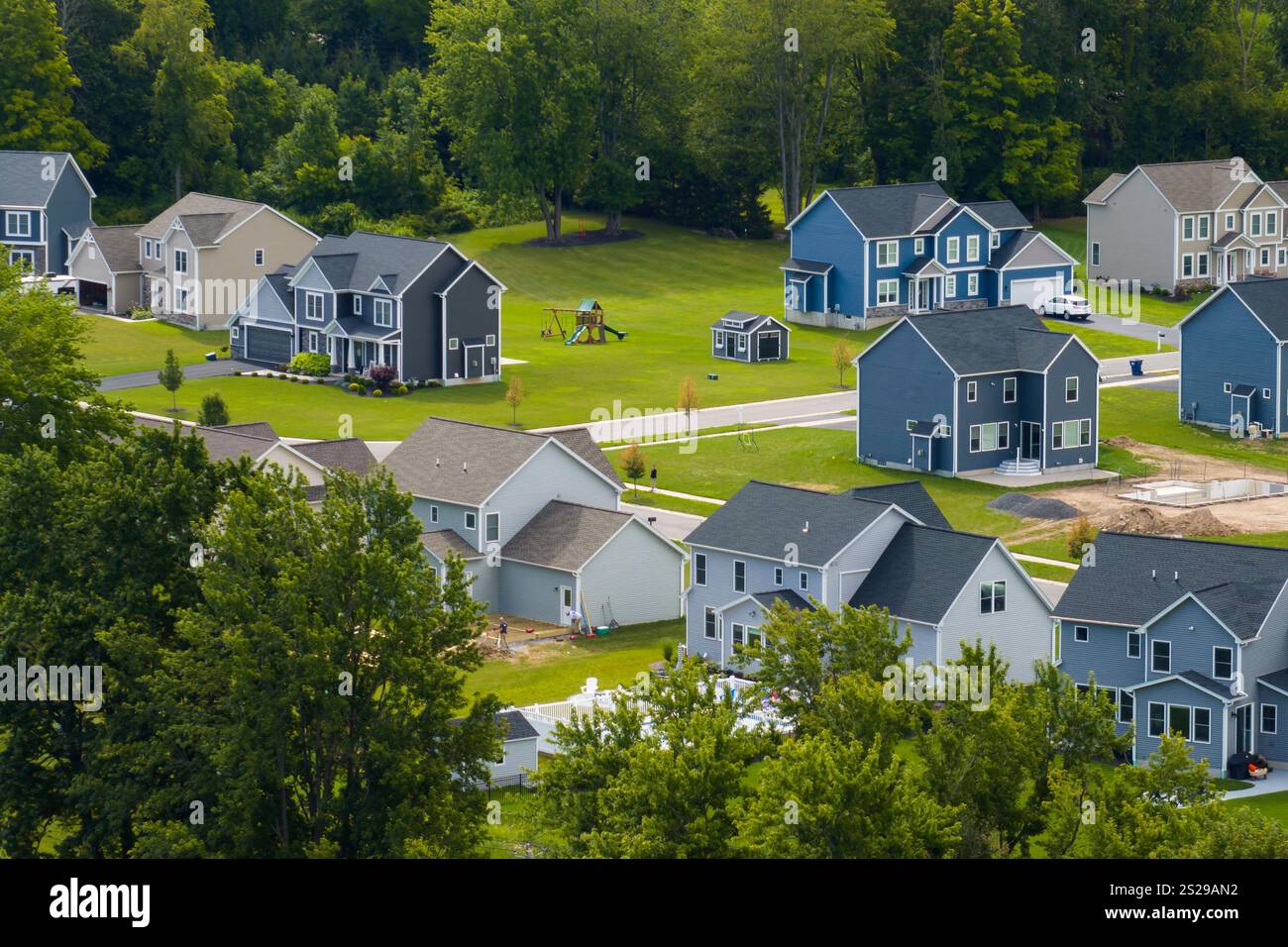 Residential homes in suburban sprawl development in Rochester, New York ...