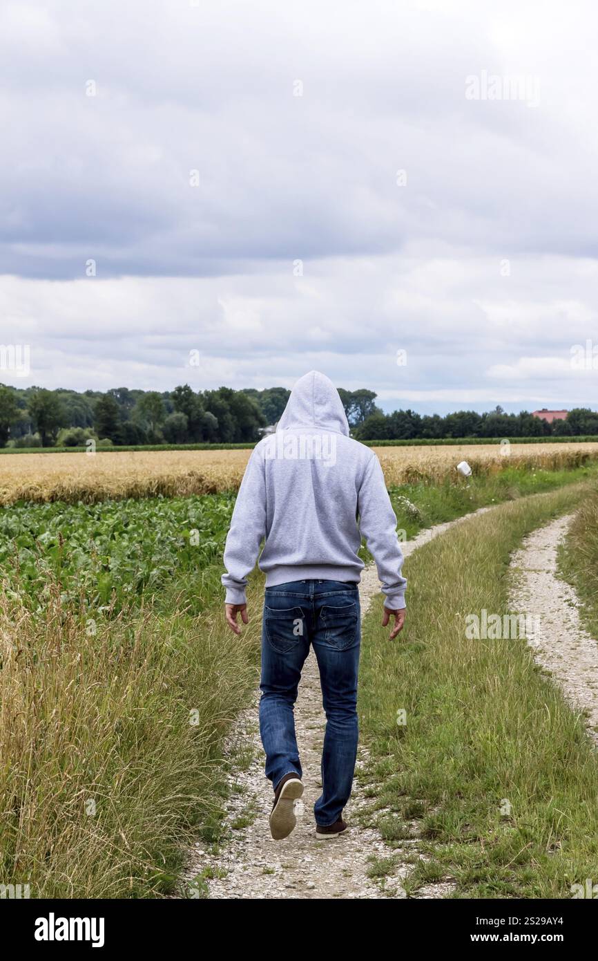 Man walks alone hi-res stock photography and images - Alamy