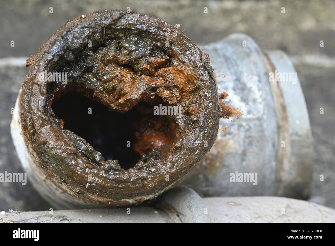 Dirty water pipe Stock Photo - Alamy