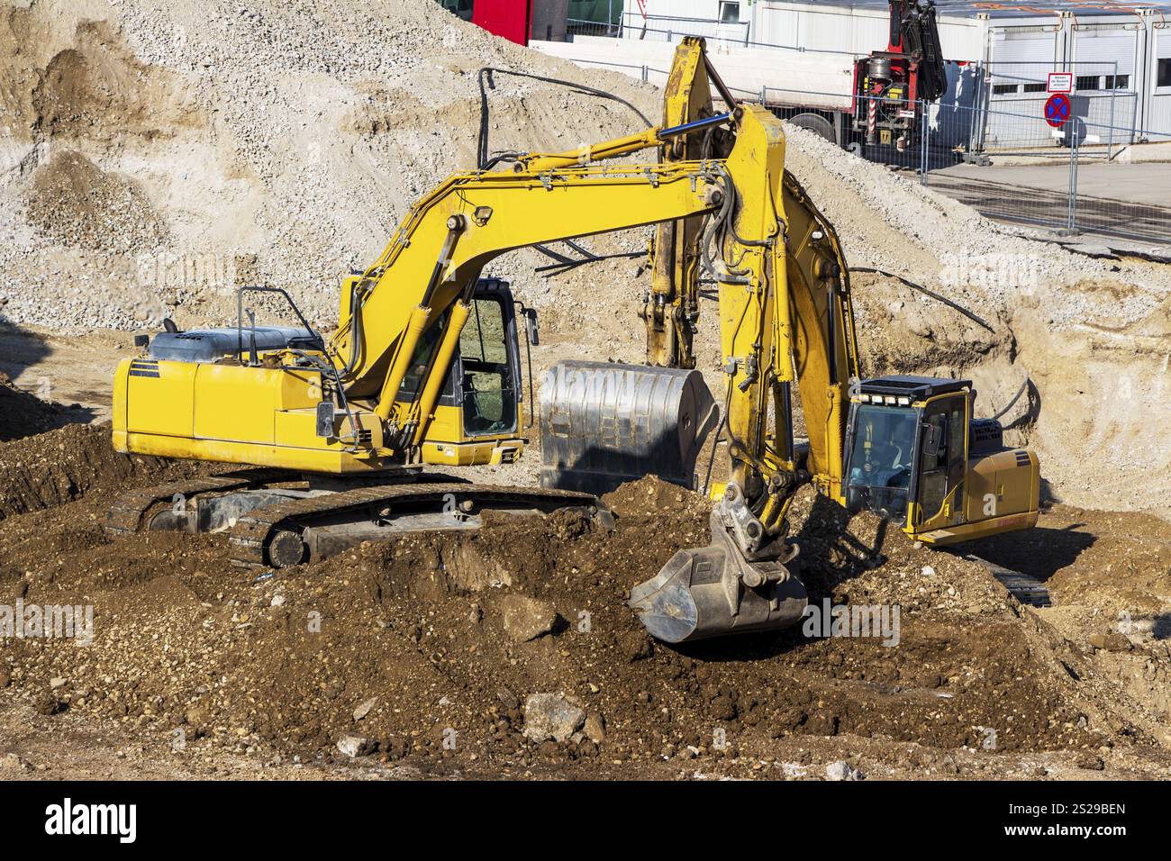 Excavator on a building site. Excavator shovel with earth, earthworks ...