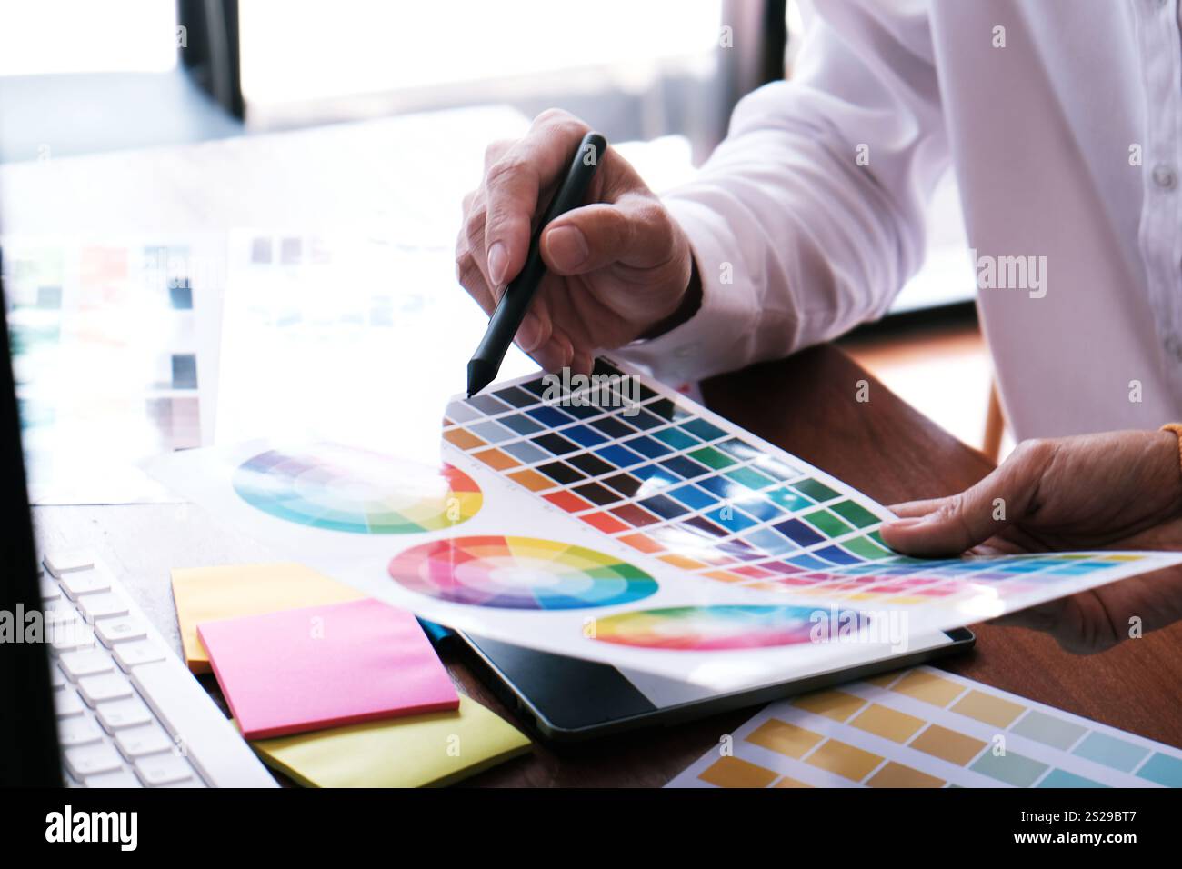 Graphic designer working on digital tablet. artist drawing on graphic ...