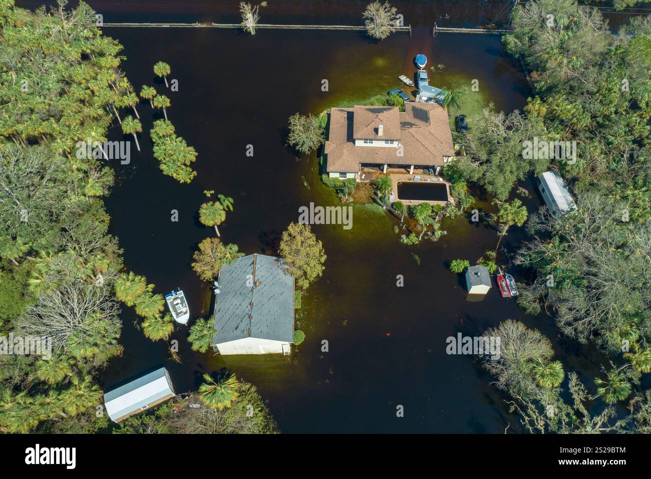 Surrounded by hurricane Ian rainfall flood waters homes in Florida ...