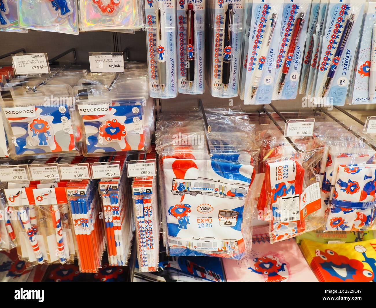 Various Osaka Expo '25 goods including pencils and pens featuring Myaku ...