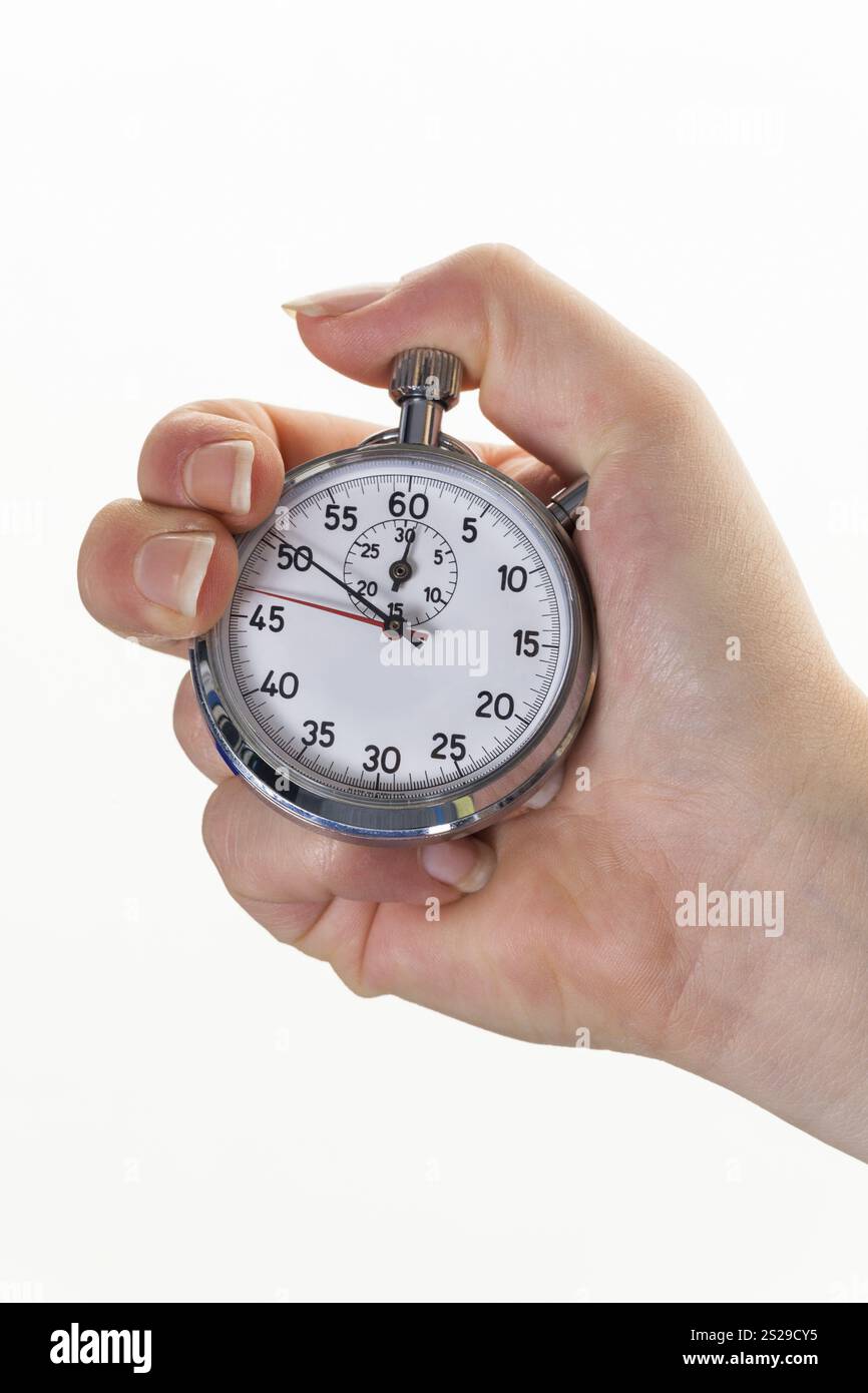 A hand with a stopwatch to measure time. Isolated white background ...