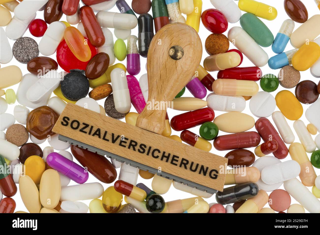 Stamp on colourful tablets, symbol for social insurance, medication and ...