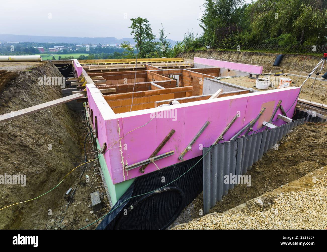 The shell of a detached house in solid brick construction. Building ...