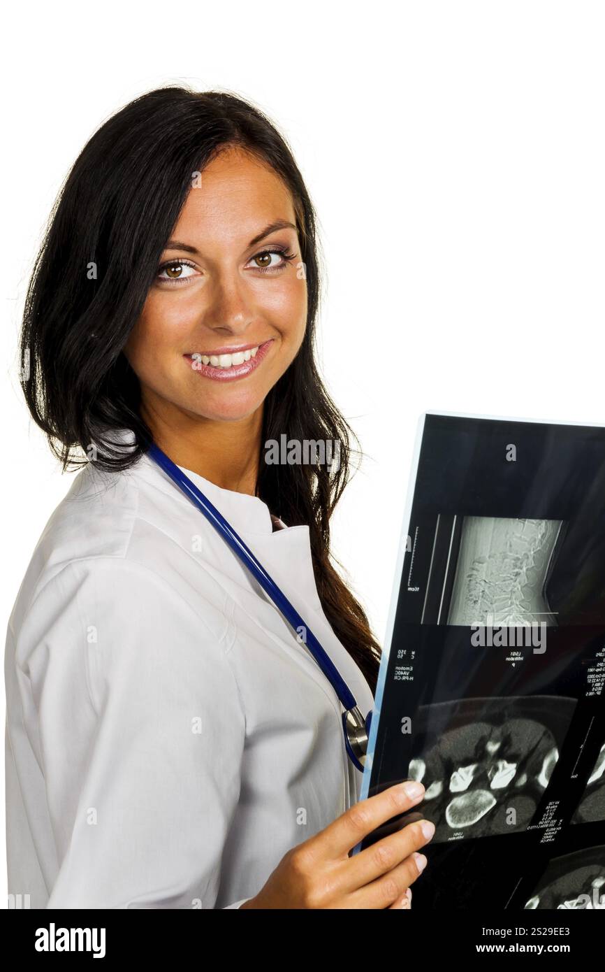 A doctor holds the X-ray image of an intervertebral disc infiltration ...