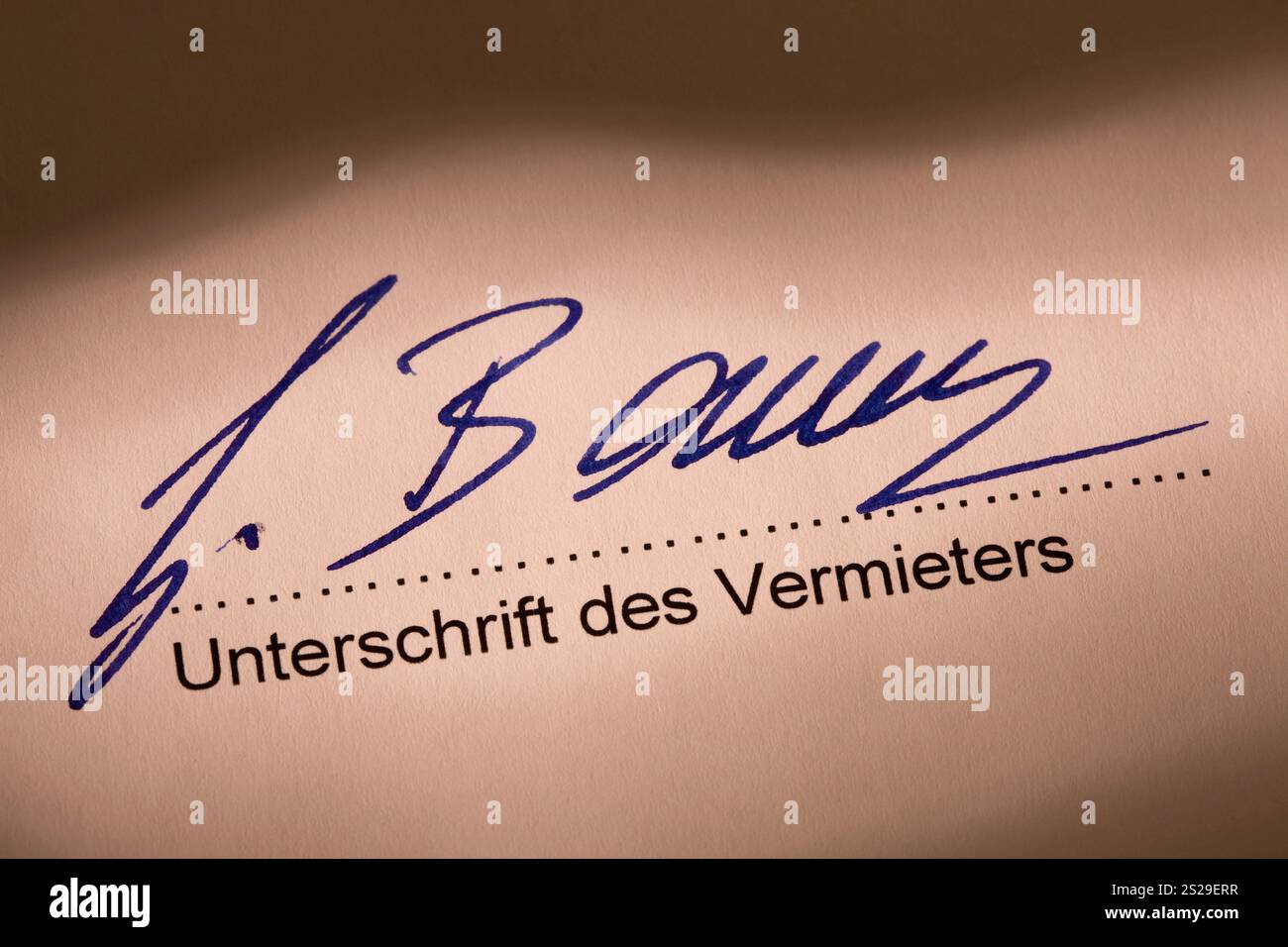 Signature of the landlord under a new tenancy agreement Stock Photo - Alamy