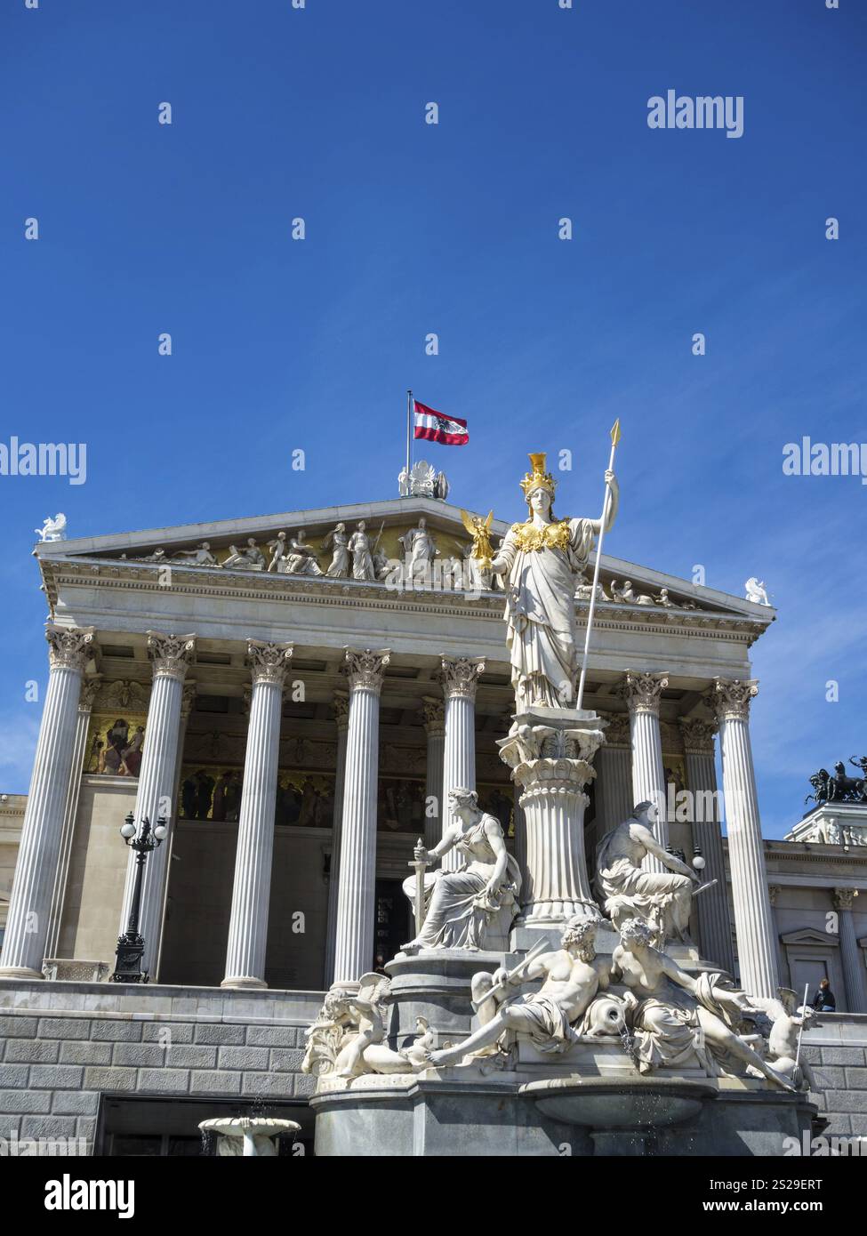 The parliament in Vienna, Austria. With the statue of Pallas Athena ...