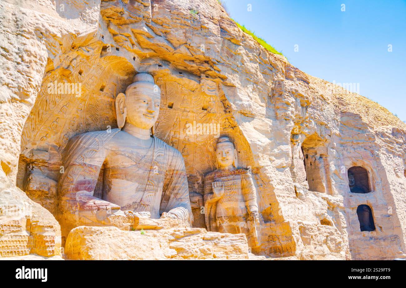 Giant Buddha statue at Yungang Grottoes in Datong, Shanxi Stock Photo ...