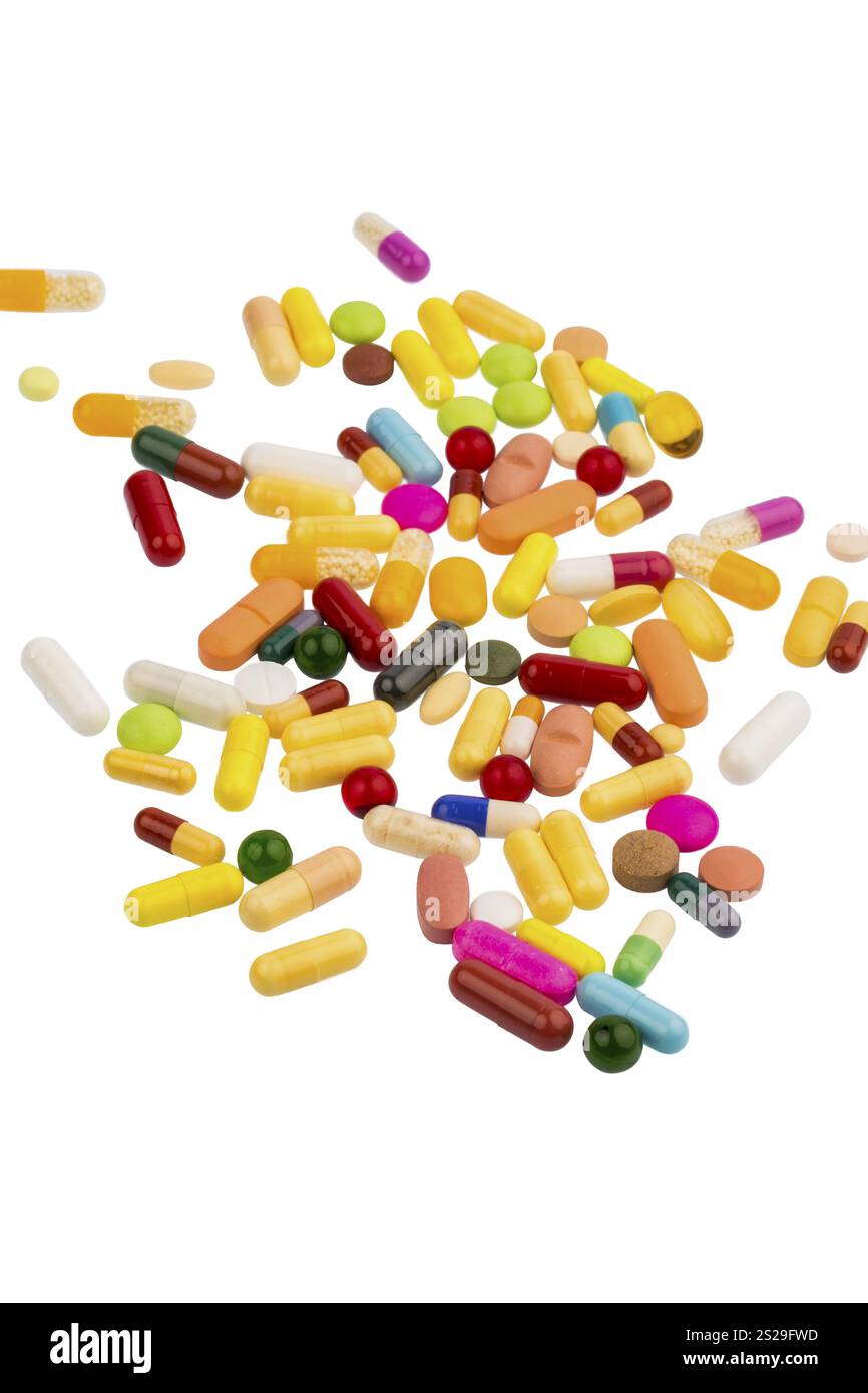 Lots of colourful tablets on a white background. Symbol photo for ...