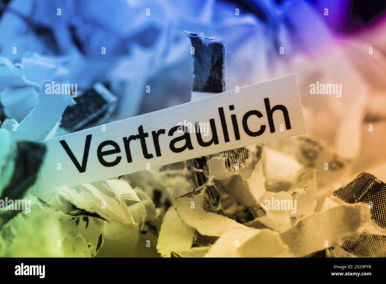 Paper shreds with the keyword Confidential, symbolic photo for data ...