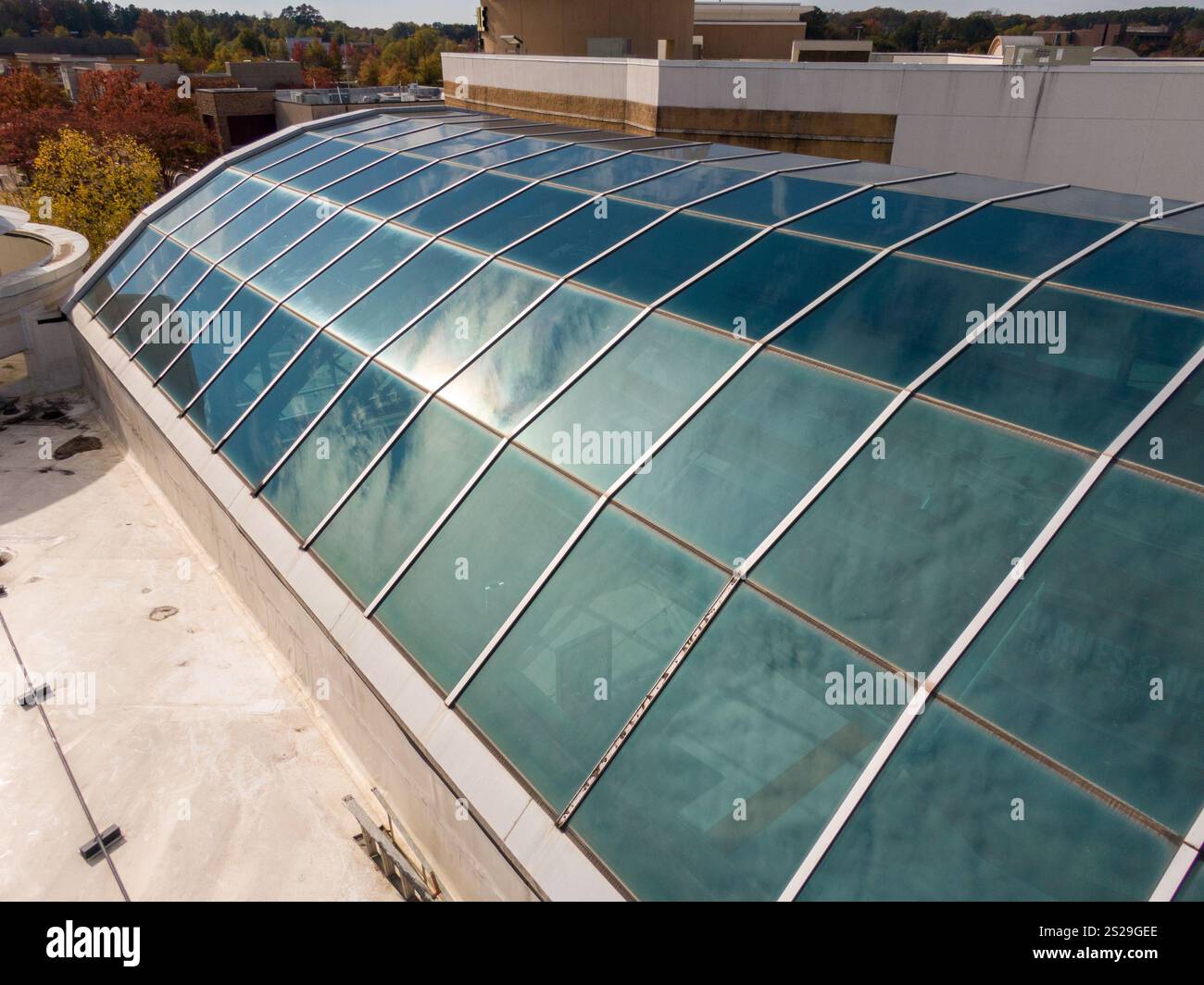 Day Time Drone Images of Large Commercial Building With a TPO Roof and ...