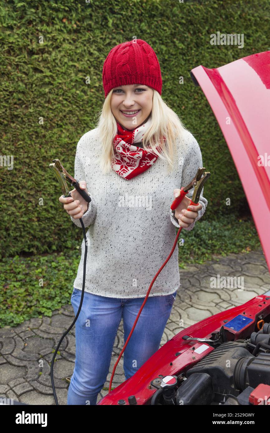 Young woman starts car hi-res stock photography and images - Alamy