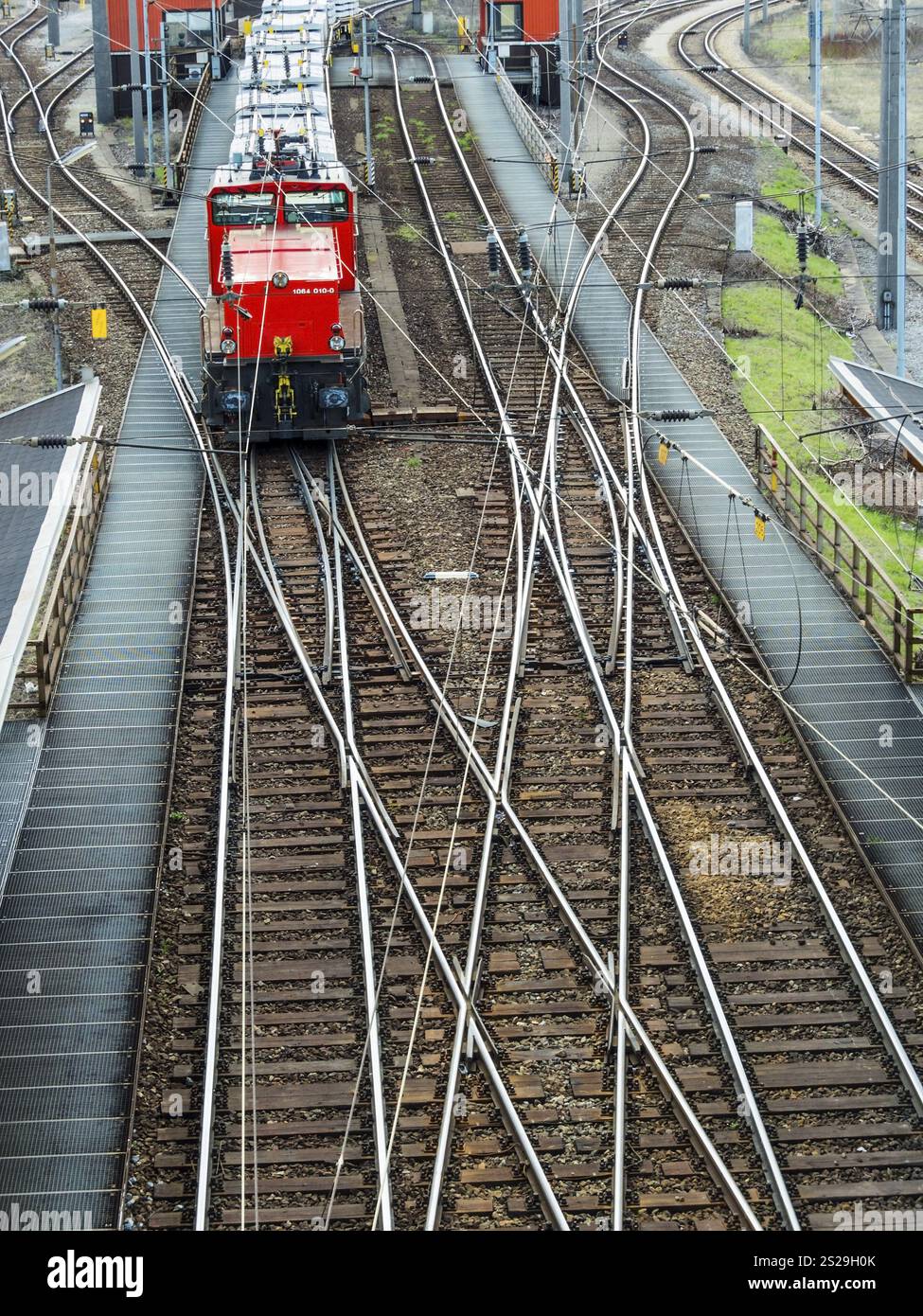 Goods trains at a marshalling yard in Vienna. Transport of freight by ...