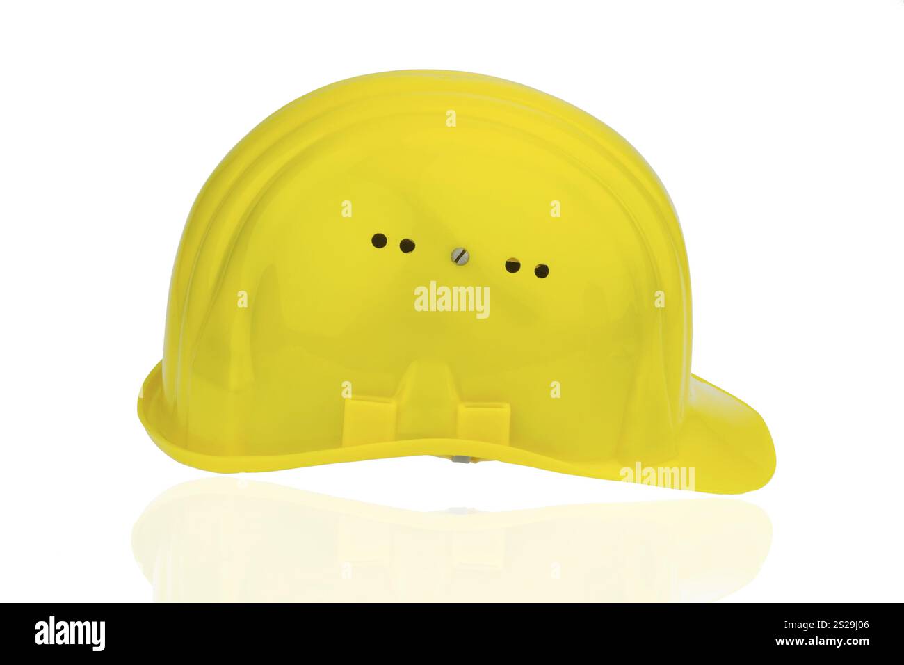 Yellow industrial safety helmet, symbolic photo for Labour ...