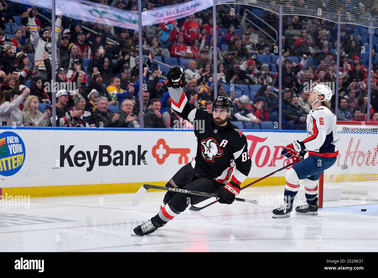 Buffalo Sabres Right Wing Alex Tuch Left Celebrates After Scoring As