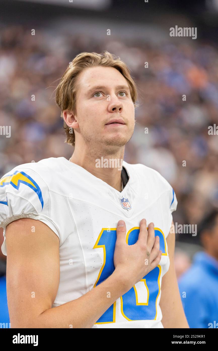 Los Angeles Chargers punter JK Scott (16) stands for the national ...