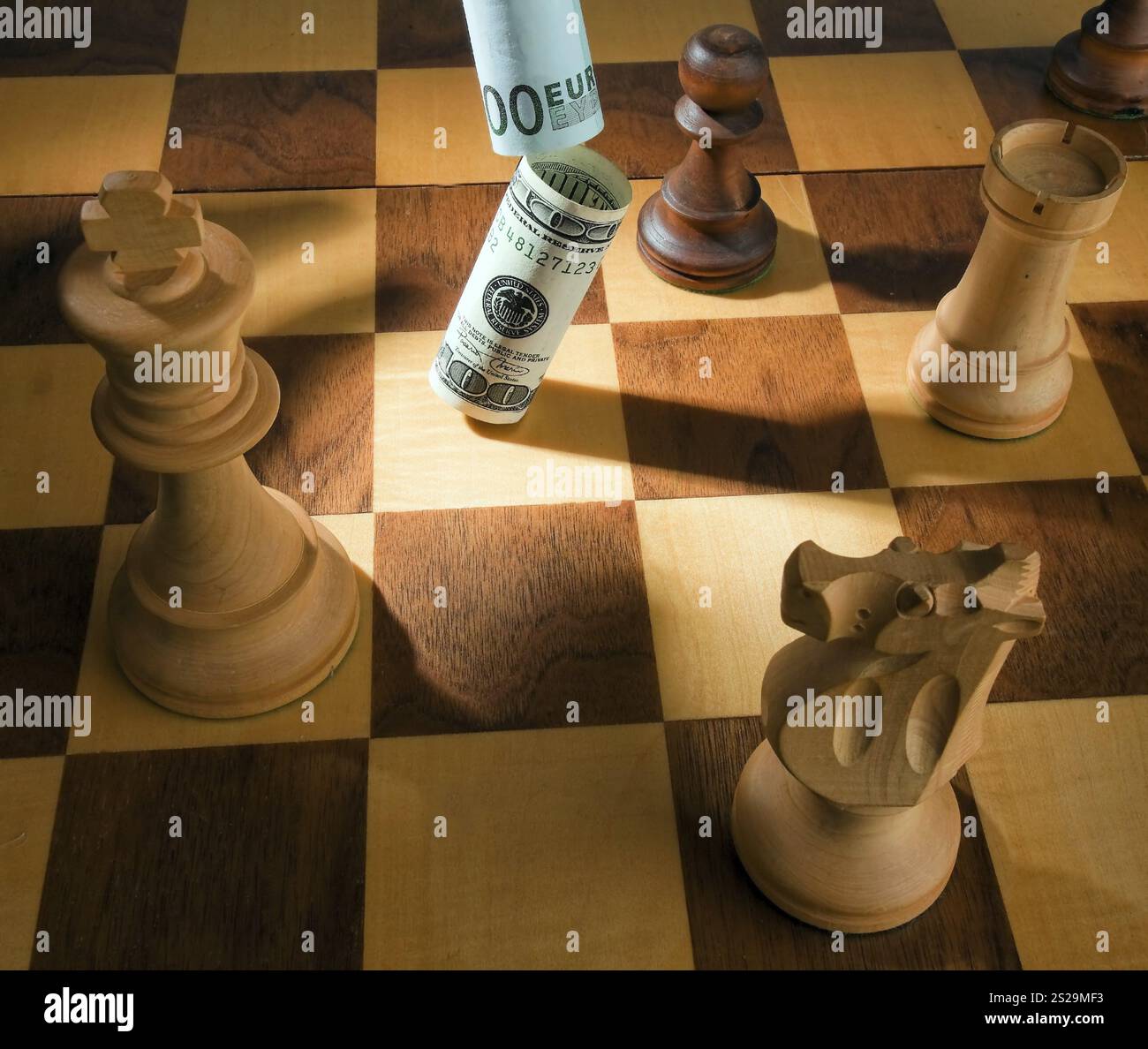 Chess with dollar and euro banknote. Symbol for devaluation of the ...