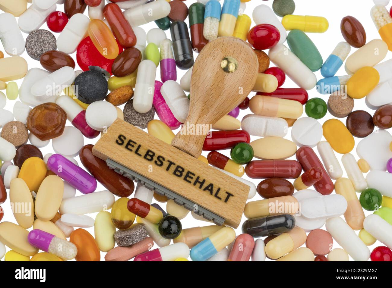 Stamp on coloured tablets, symbol photo for medication, health ...