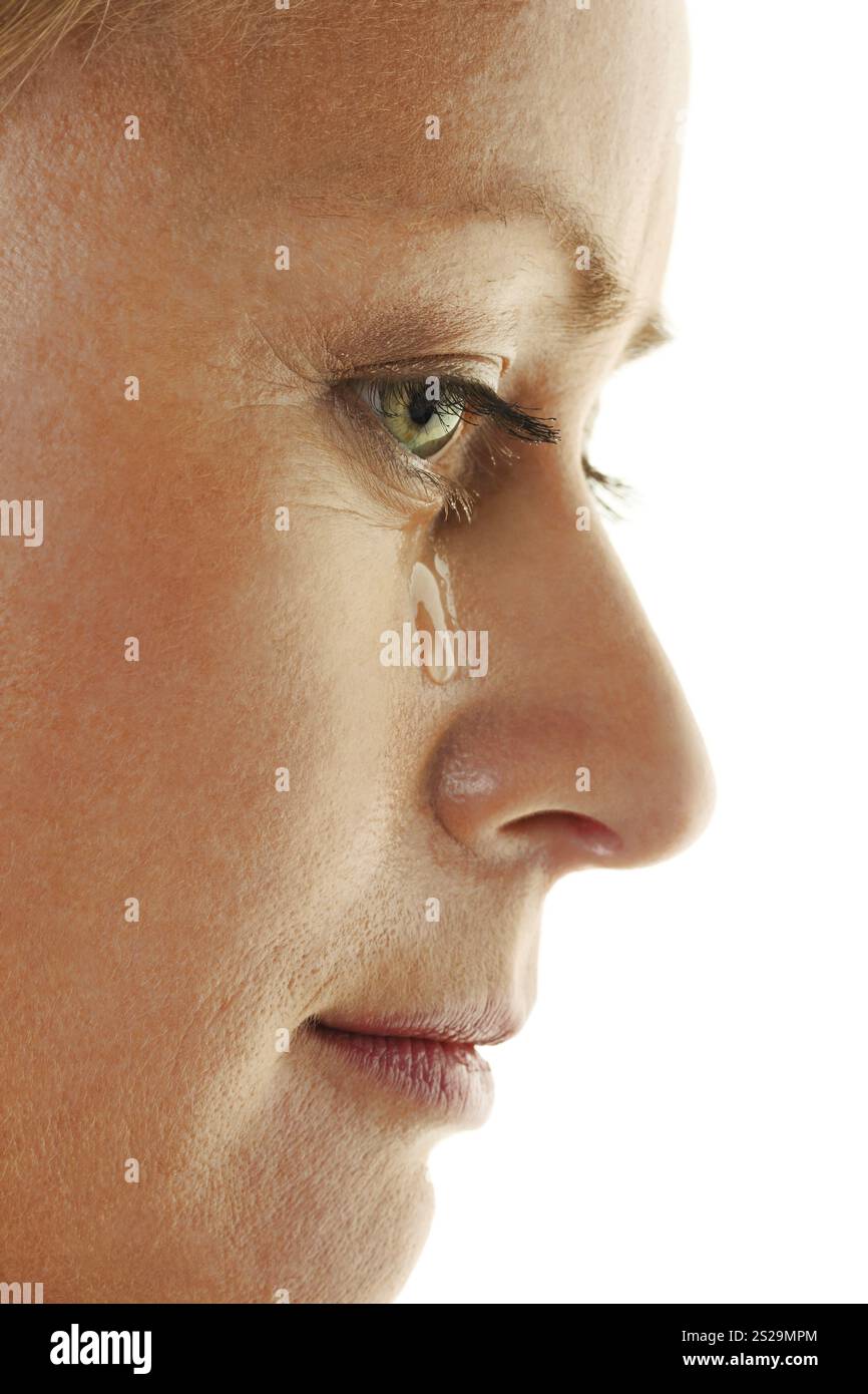 Woman is sad and crying. Tear on cheek. Austria Stock Photo - Alamy