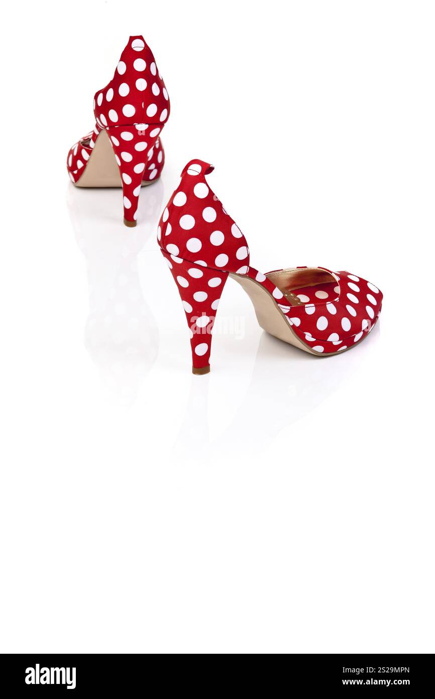 Red ladies shoes high heels with white dots Stock Photo - Alamy