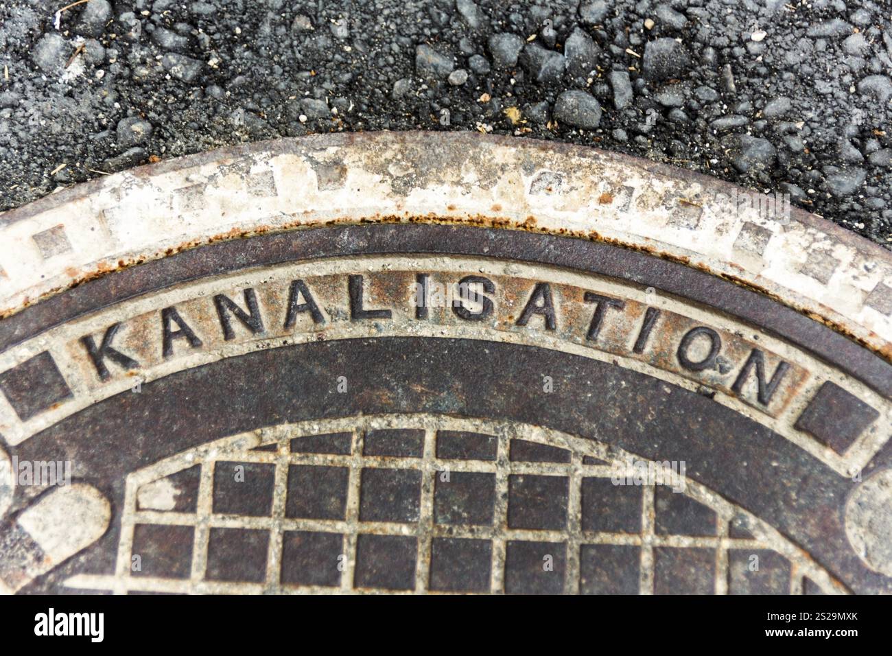 Cover for the sewerage system, symbolic photo for Wastewater Disposal ...