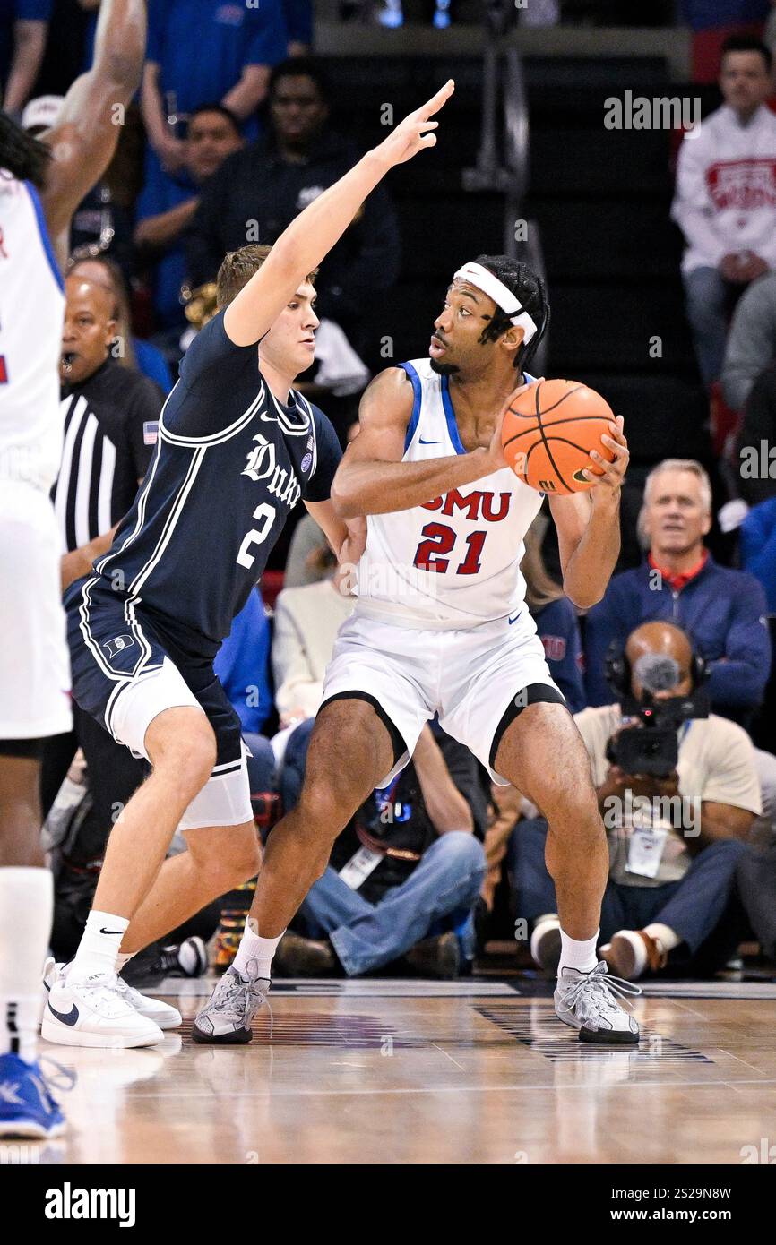 SMU forward Yohan Traore (21) looks to move to the basket past Duke ...