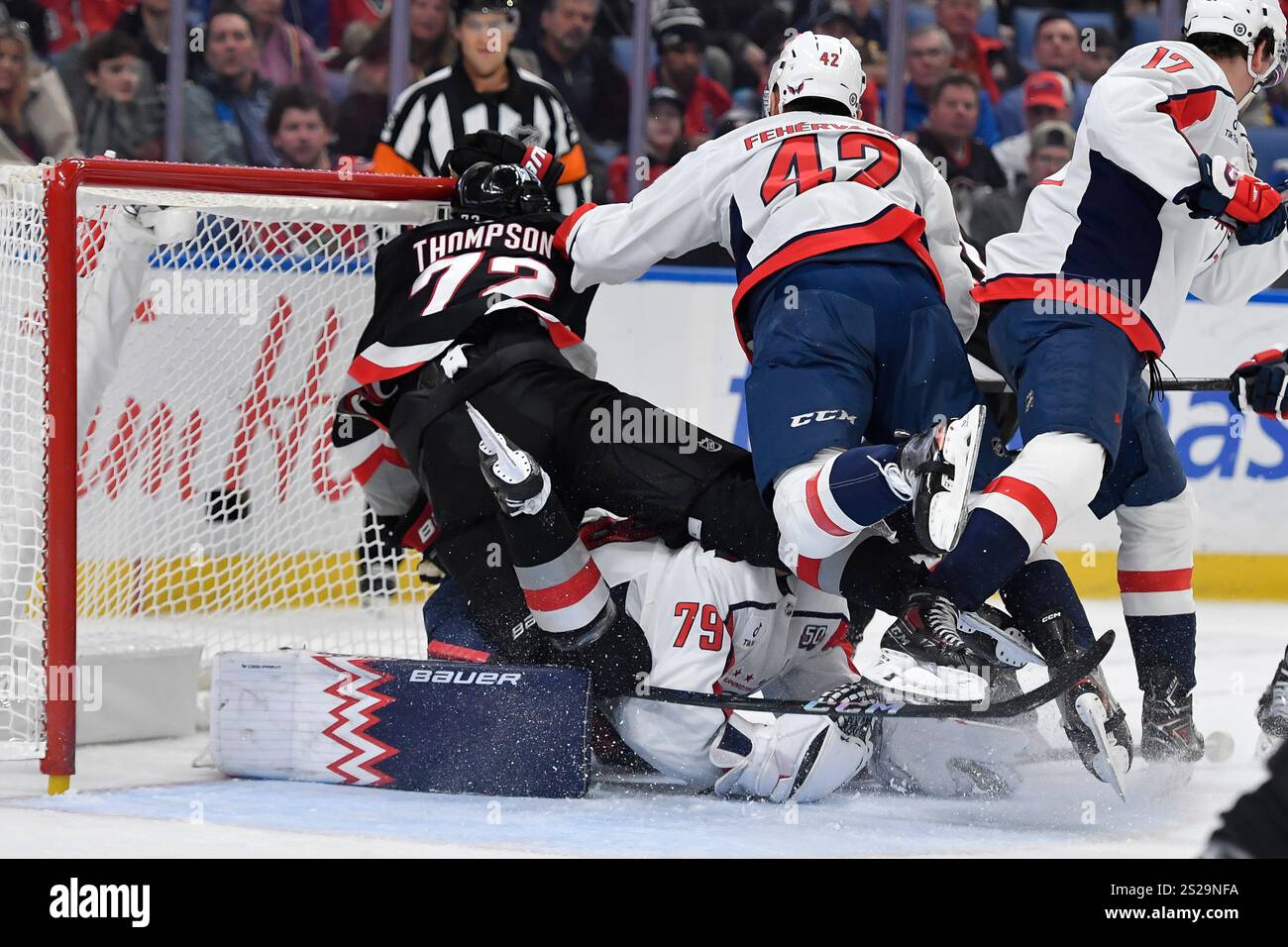 Washington Capitals defenseman Martin Fehervary (42) pushes Buffalo ...