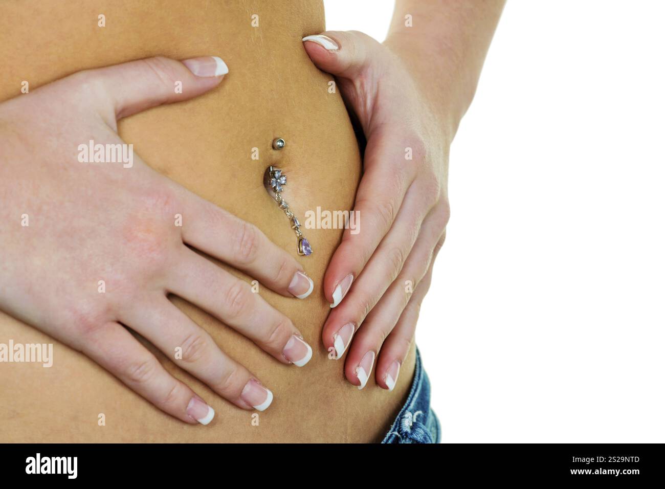 A woman has stomach ache or stomach pain. Hands in heart shape around ...