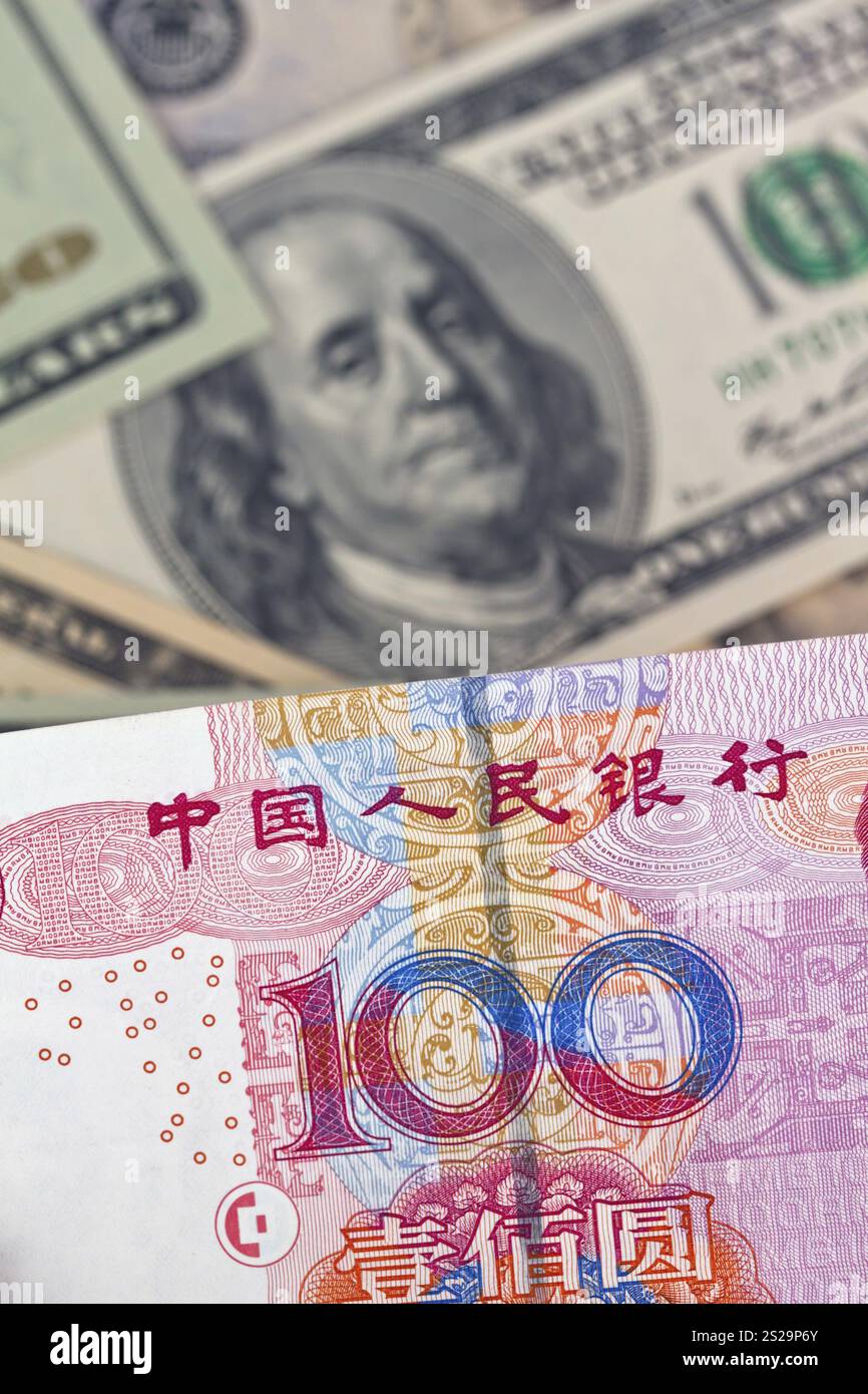 Chinese currency yuan and American dollar banknotes Stock Photo - Alamy