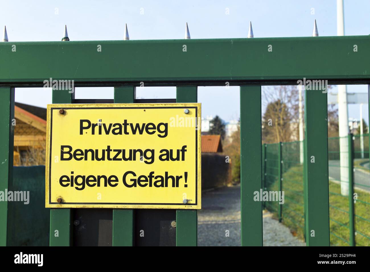 A sign Private path - use at your own risk indicates the dangers and ...