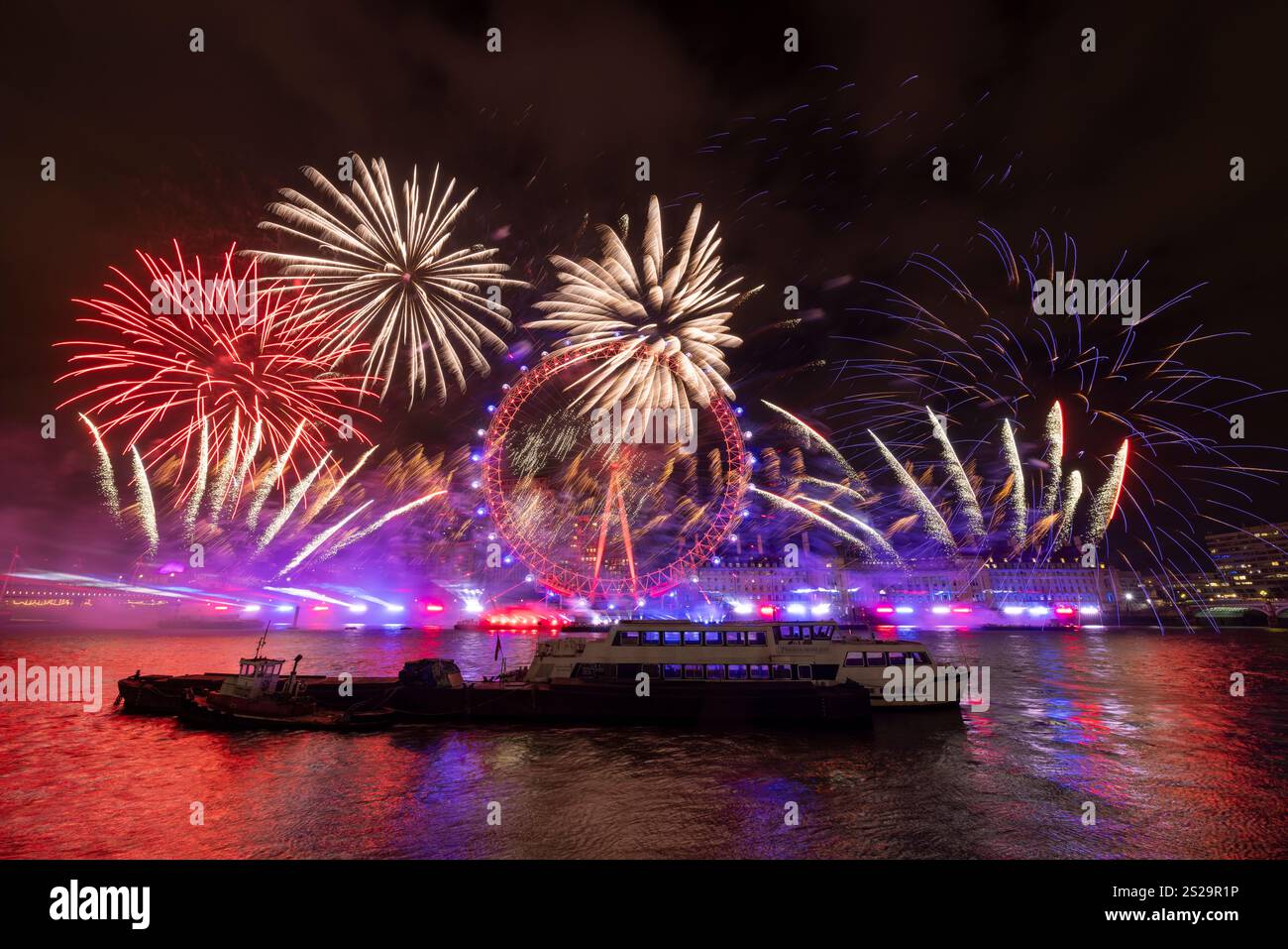 Fireworws in London eye celebration new year 2025 Stock Photo - Alamy