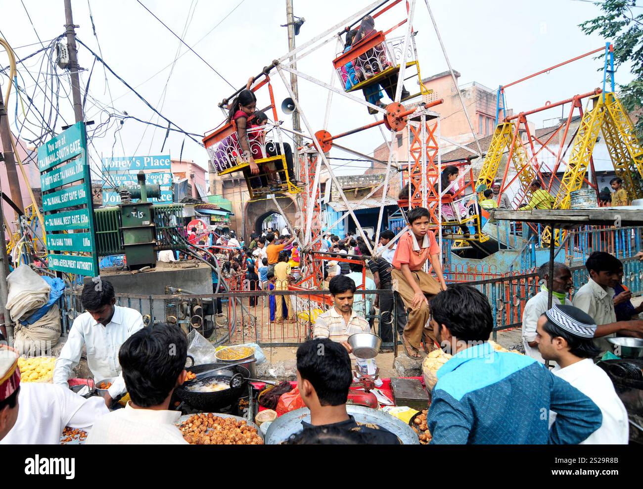 Children having fun at a small amusement park at the South Gate ( Taj ...