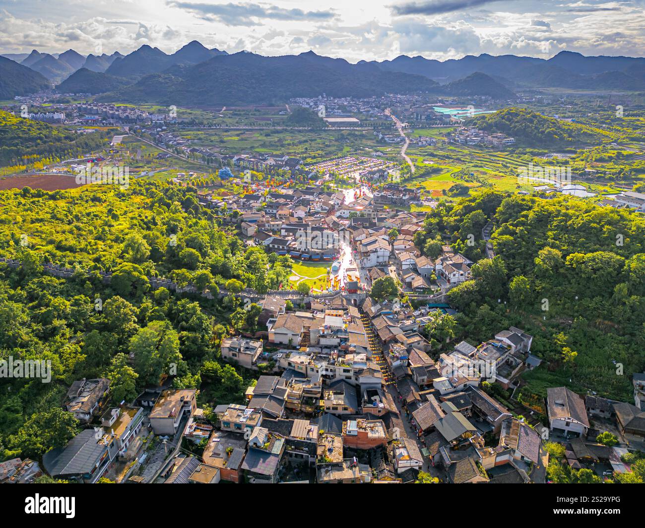 Aerial of the streets in the Qingyan Ancient Town, one of the top 4th ...