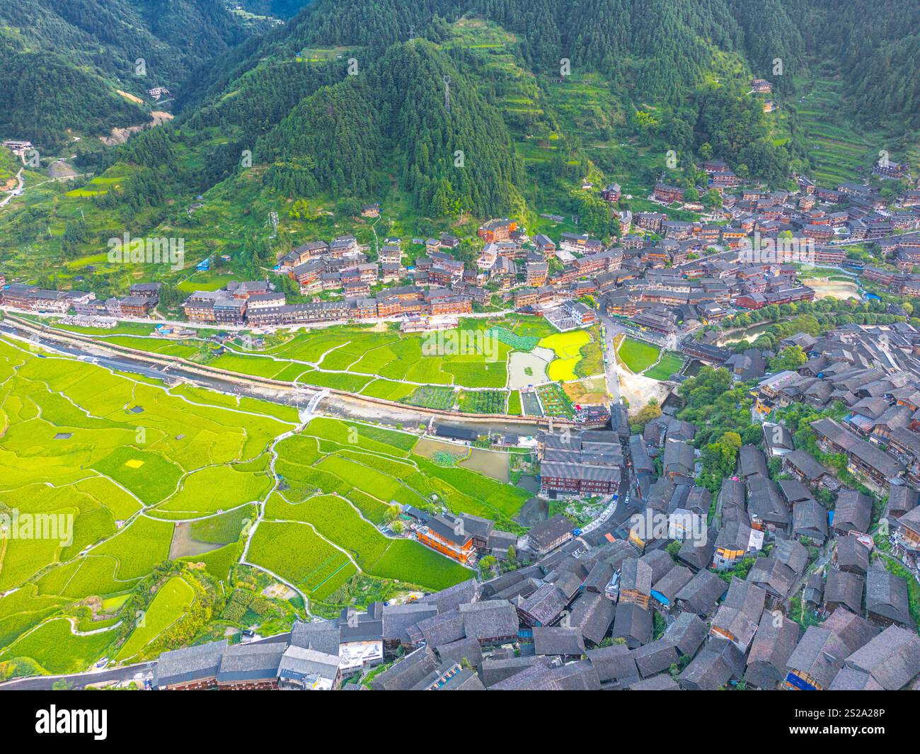 Aerial vie on the village surrounded by Rice terraces and limestone ...