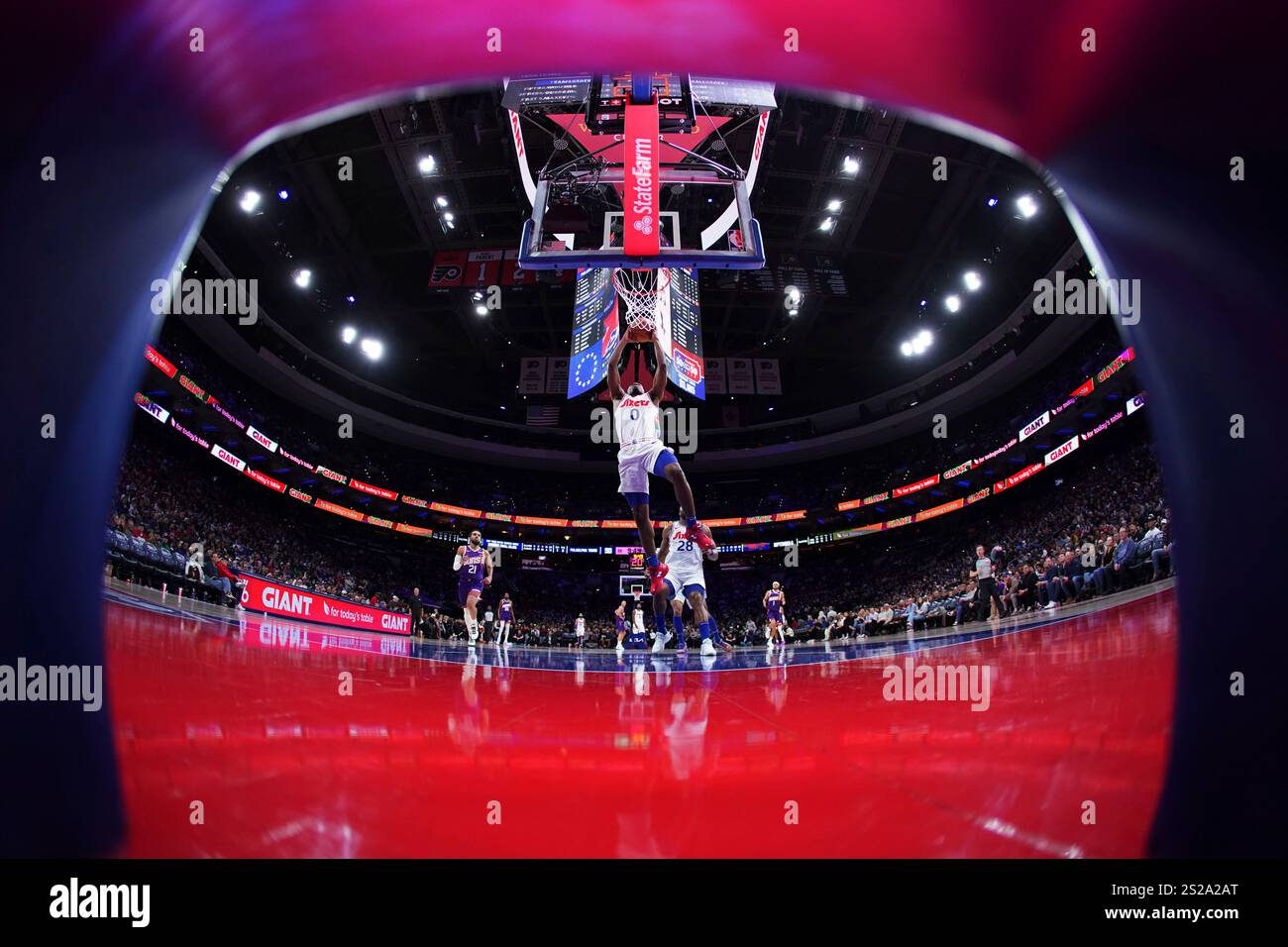 Philadelphia 76ers' Tyrese Maxey goes up for a dunk during the second ...