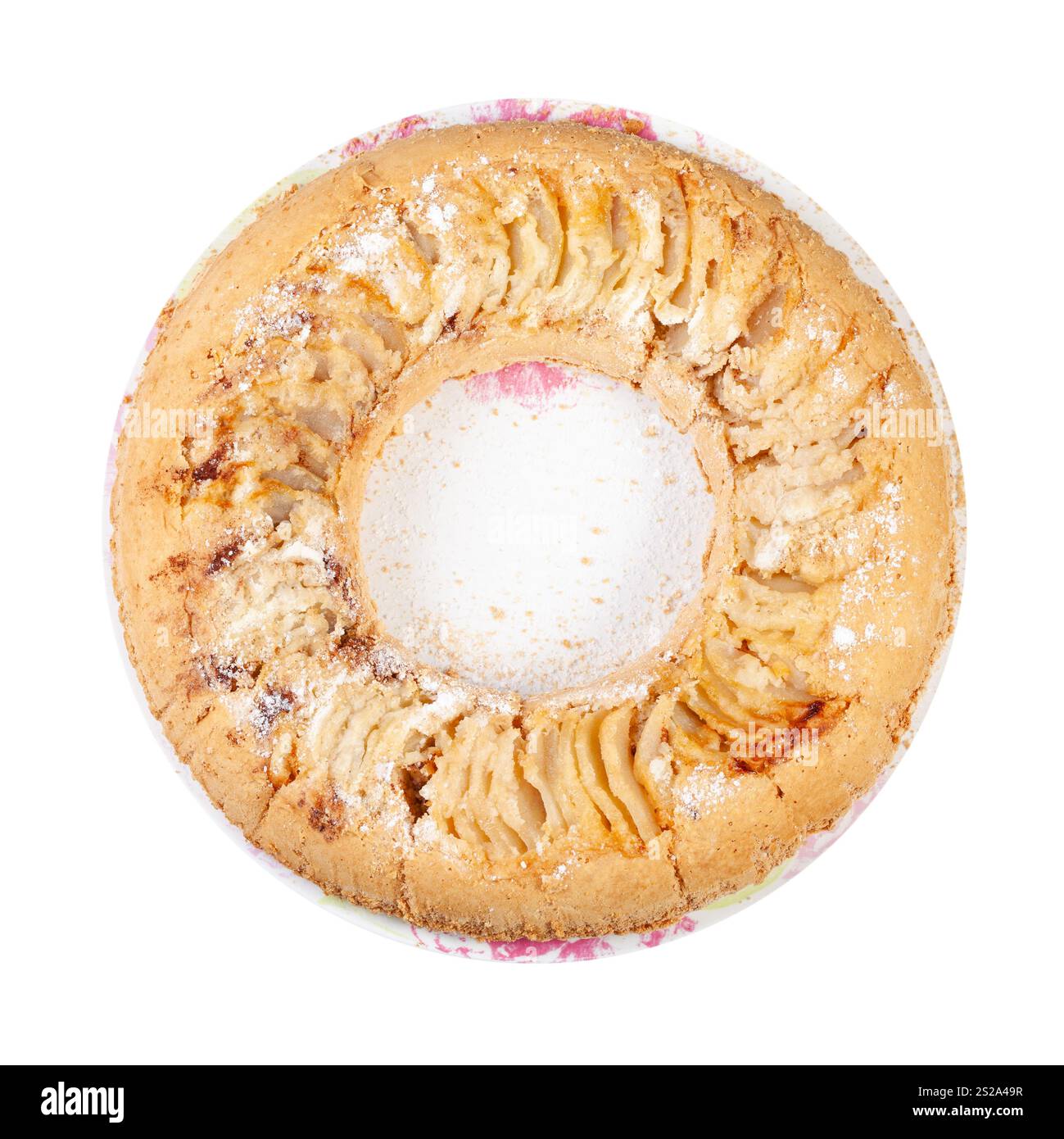 top view of torus-shaped Russian Charlotte apple cake on plate isolated ...