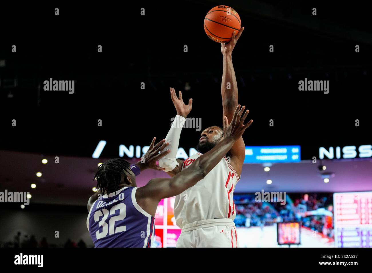 Houston forward J'Wan Roberts (13) shoots against TCU center Malick ...