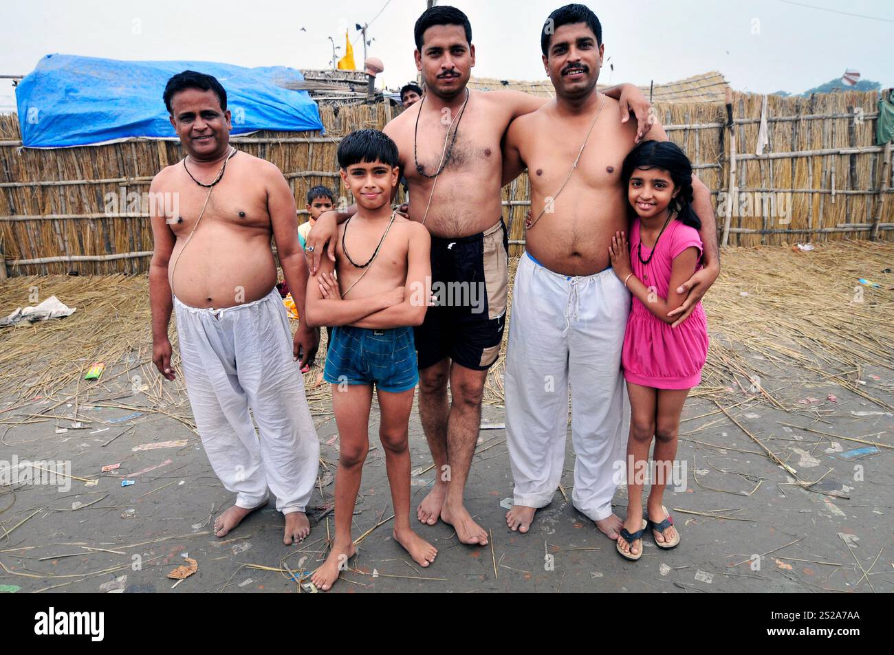 A Brahmin family posing for a picture on the banks of the Ghagra river ...