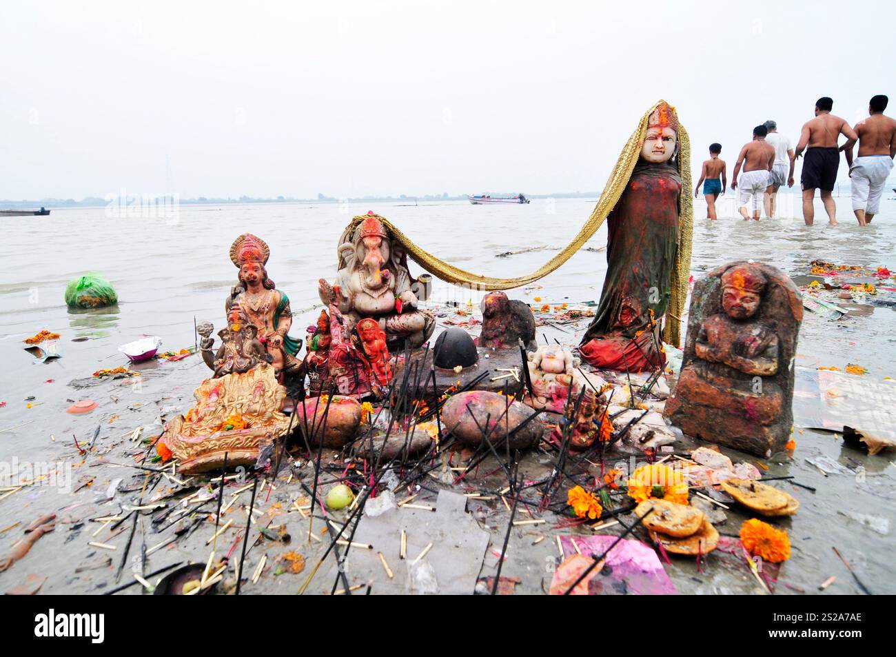 Tiny god statues in a small Hindu temple on the bank of the Ghaghara ...