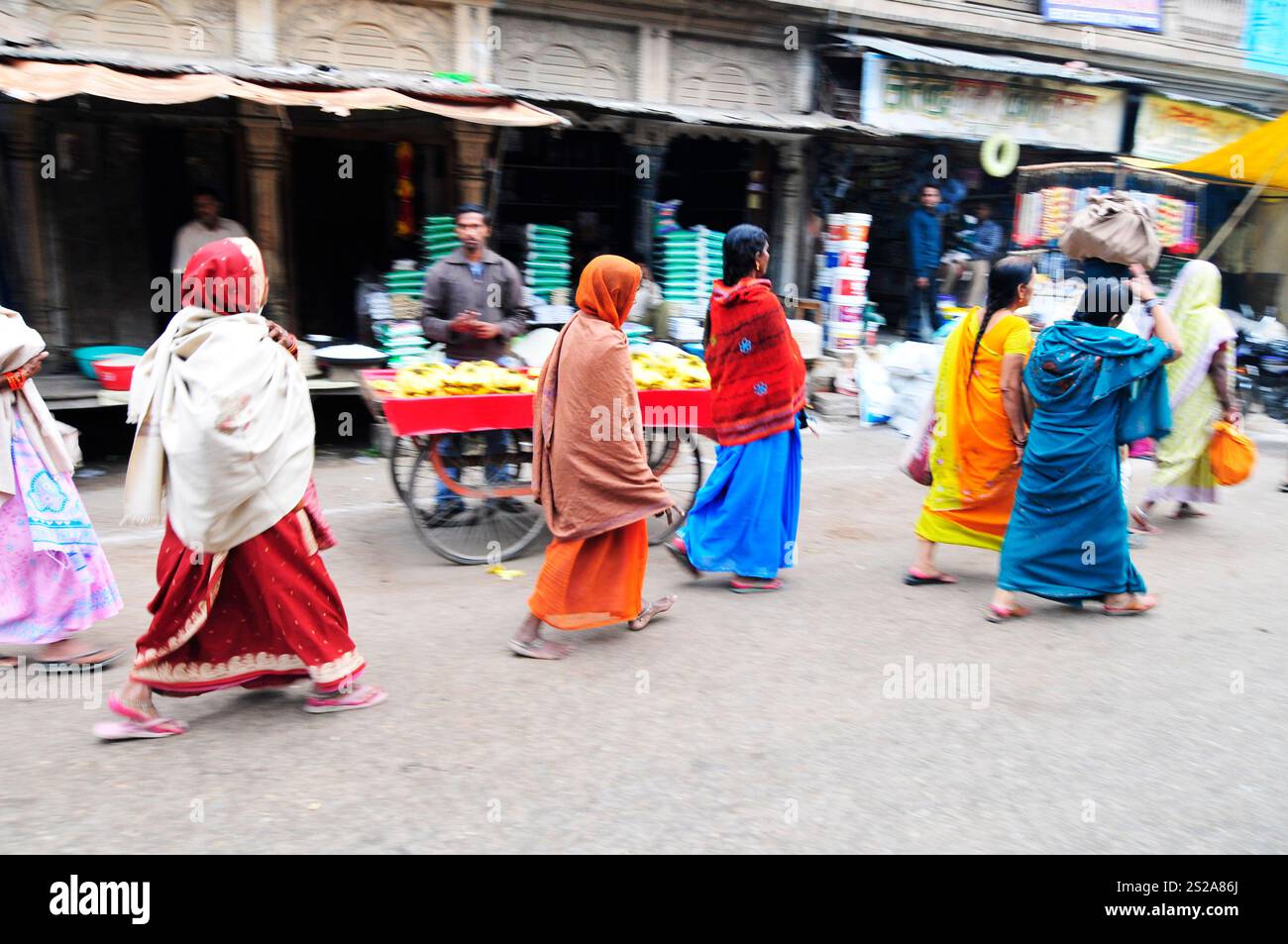 Pilgrims walk between Hindu temples in the city of Ayodhya, India Stock ...