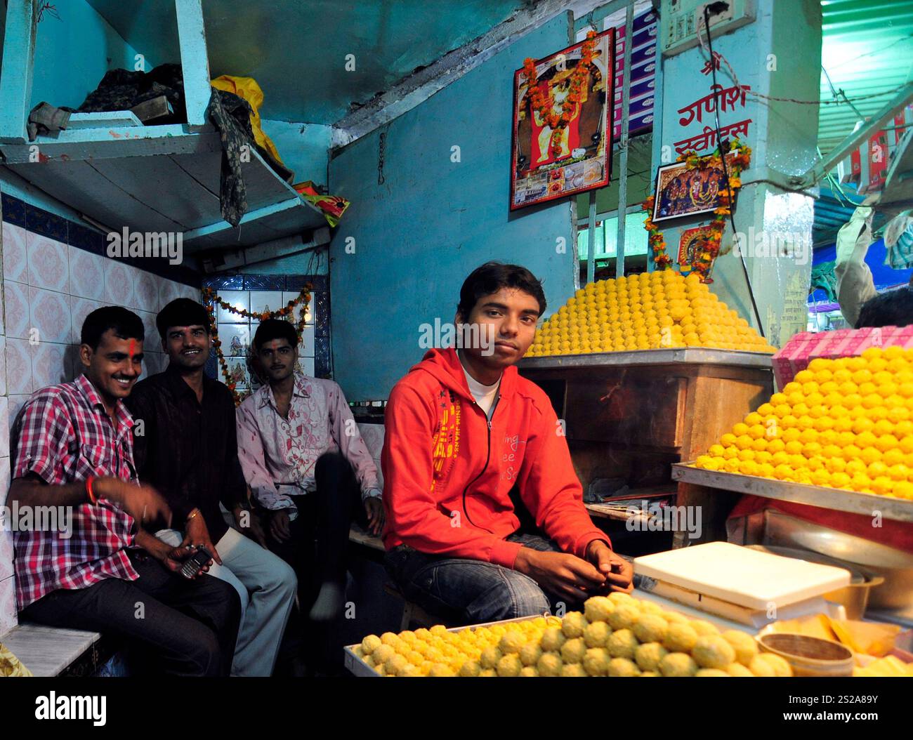 A shop selling laddu, a typical Indian sweet popular around Hindu ...