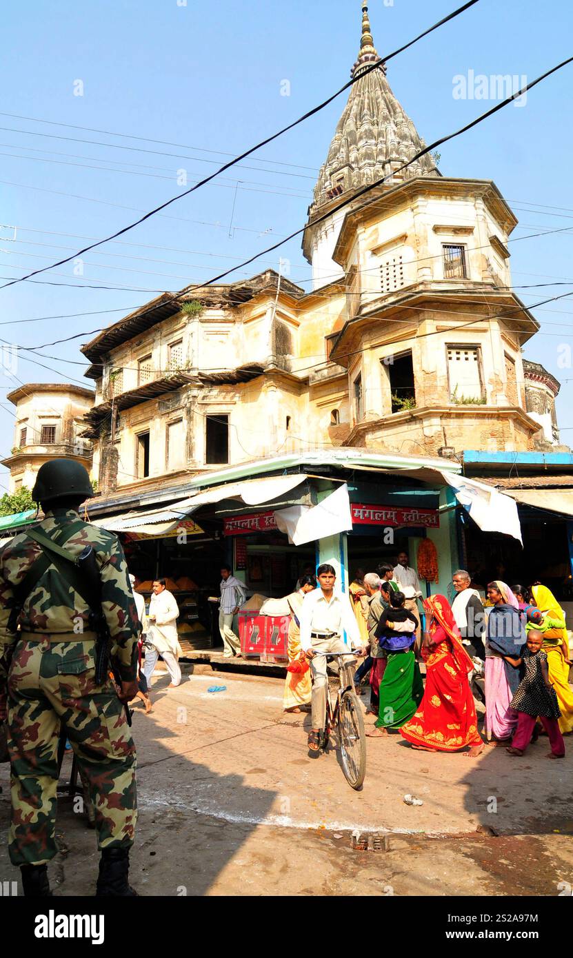 An Indian soldier securing the area around the Raj Dwar Mandir in ...