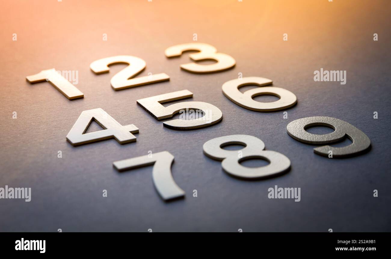 Mathematics background made with solid numbers from 1 to 9 - Closeup ...