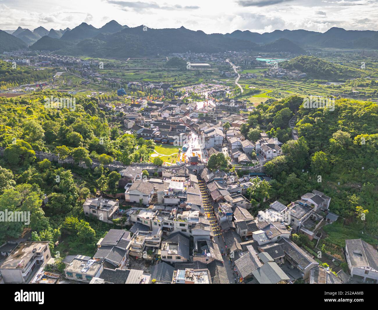 Aerial of the streets in the Qingyan Ancient Town, one of the top 4th ...