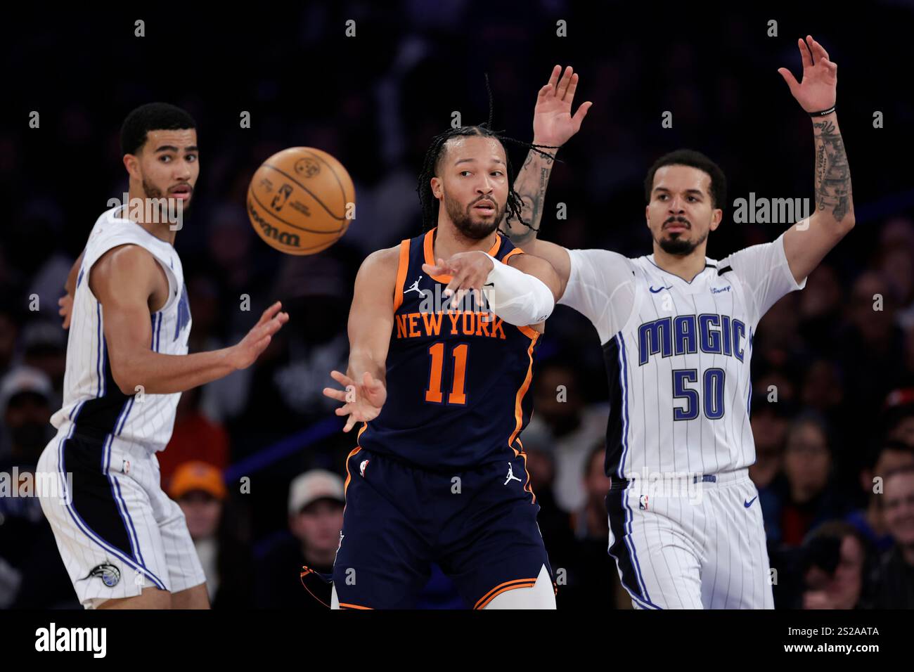 New York Knicks guard Jalen Brunson (11) passes in front of Orlando ...