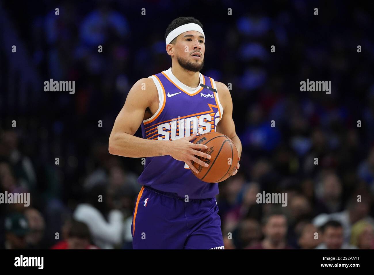Phoenix Suns' Devin Booker plays during an NBA basketball game, Monday ...
