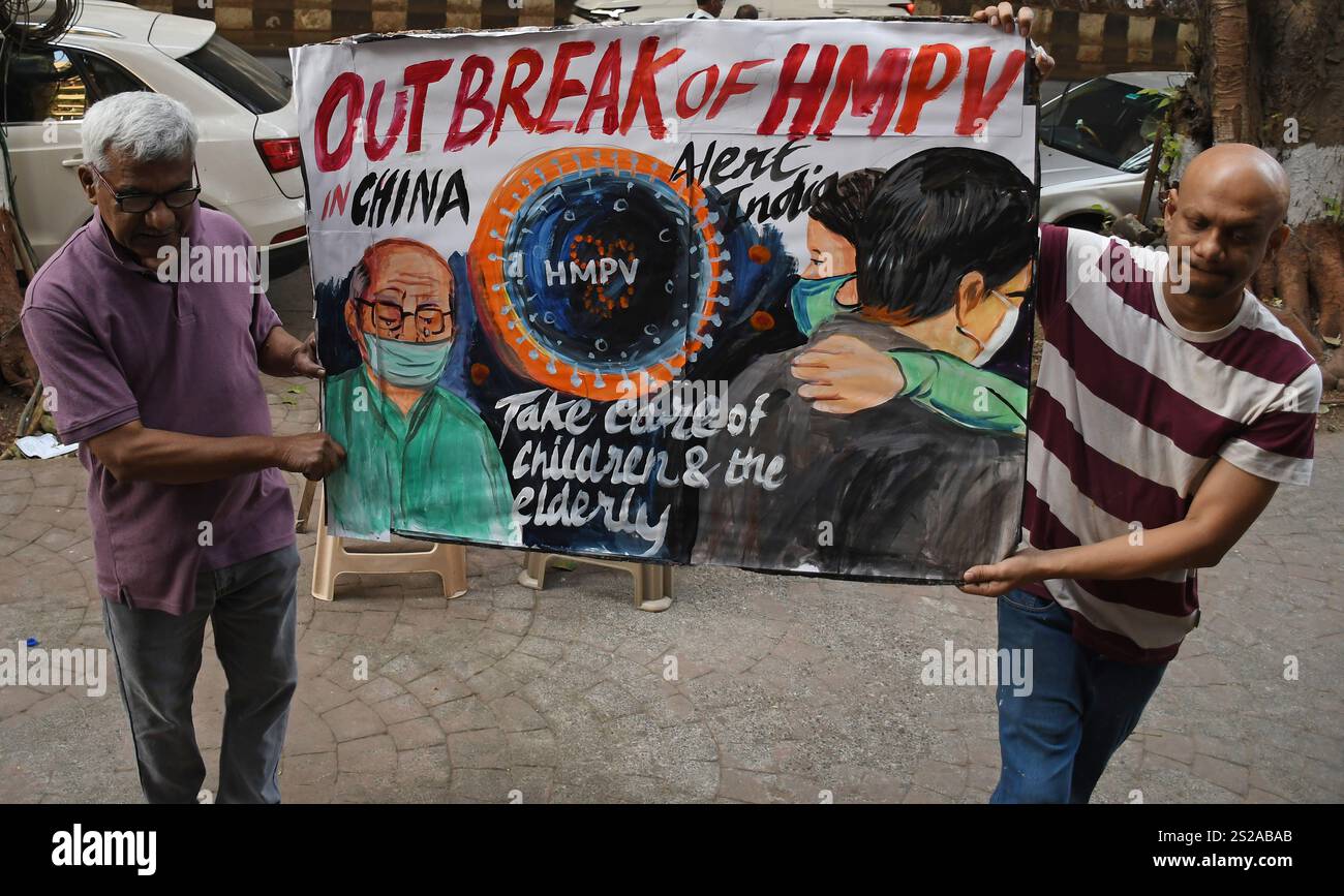 Teachers from Gurukul school of art carry back a poster painted to ...